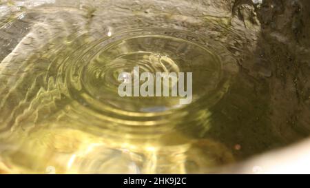 Circular dim water. Pure water vibration Stock Photo - Alamy