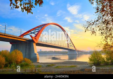 Bugrinsky bridge in golden autumn. Arched automobile bridge on the ...
