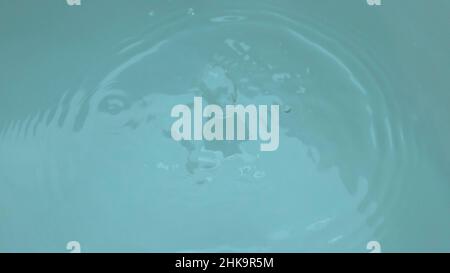 Circular dim water. Pure water vibration. With a background of water ...