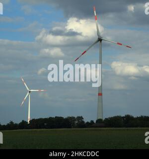 Windturbines in a cloudy sky. In Diest, Flanders, Belgium Stock Photo ...