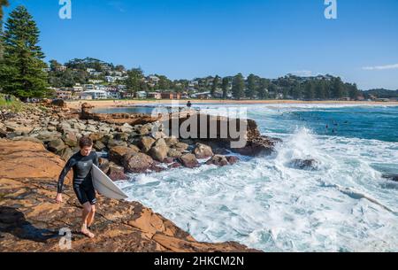 perilous surf at Avoca Rocks, Avoca Beach at the Central Coast of New ...