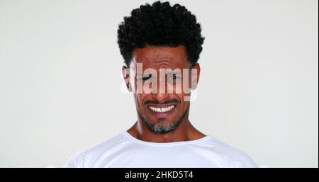 African american gradual shock reaction, face emotion black guy reacting with horror putting ...