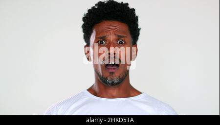 African american gradual shock reaction, face emotion black guy reacting with horror putting ...
