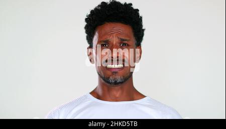 African american gradual shock reaction, face emotion black guy reacting with horror putting ...