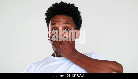 African american gradual shock reaction, face emotion black guy reacting with horror putting ...