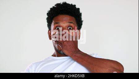 African american gradual shock reaction, face emotion black guy reacting with horror putting ...
