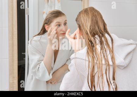 pretty woman skin problems cosmetology Studio Stock Photo - Alamy