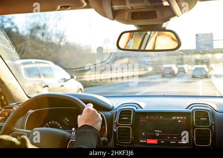 dashboard and view on car windshield Stock Photo - Alamy
