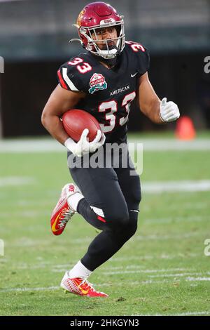 American Team running back Vavae Malepeai (33) of USC runs upfield ...