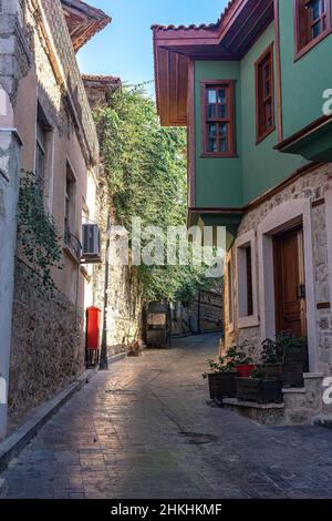narrow winding streets of Kaleiçi, historical city center of Antalya ...