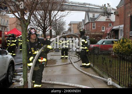 Emergency service personnel at the house Friday March 10, 2006, in ...