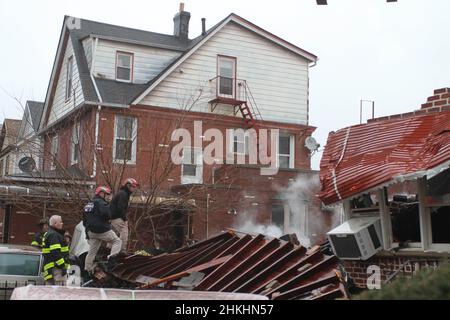 Emergency service personnel at the house Friday March 10, 2006, in ...