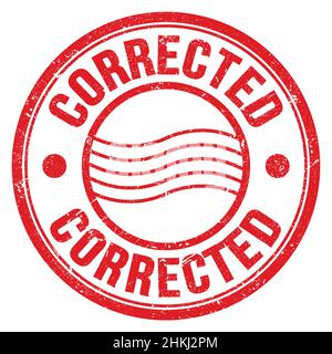 CORRECTED text written on red rectangle stamp sign Stock Photo - Alamy