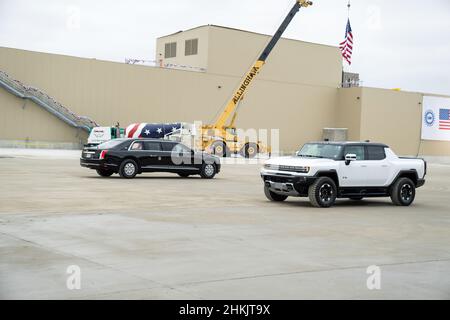 President Joe Biden test drives the Hummer EV during a tour of the ...