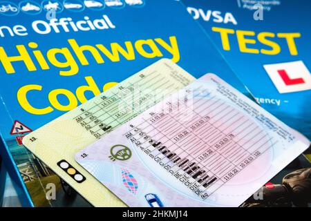 UK Provisional Driving Licence cards placed on top of the genuine ...