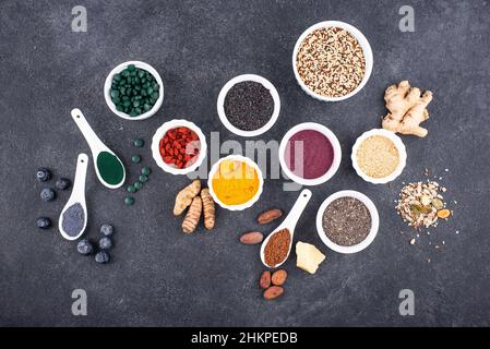 Various healthy superfoods powder assortment Stock Photo - Alamy