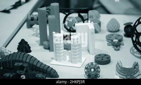 Many abstract models bright colorful objects printed on a 3d printer ...
