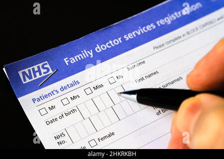 NHS family doctor services registration form Stock Photo - Alamy