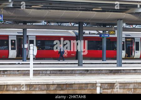 Northern rail train driver walking to the cab of a class 333 train at ...