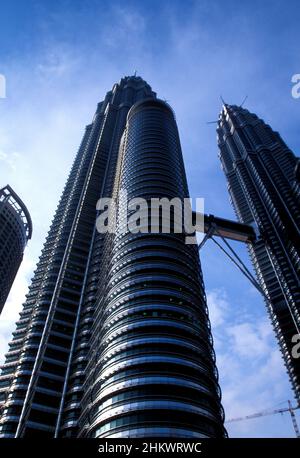 Petronas twin towers. Petronas (Petroliam Nasional Berhad) is a highly ...