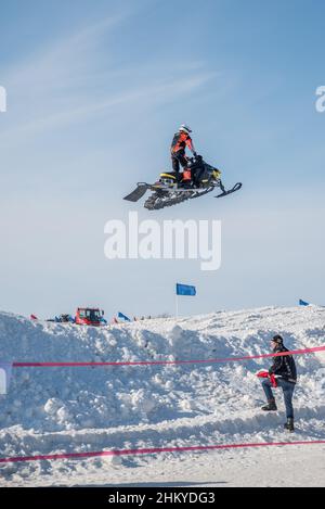 Snowmobile race at the Reindeer Herders Festival in Salekhard, Yamalo ...