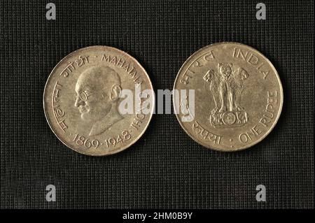 An ancient silver Indian coin is one rupee. United Provinces of Agra ...