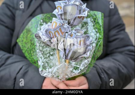 american dollar in winter jacket pocket, money in pocket, financial ...