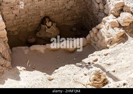Bones in open inca cemetery in Nazca region , Peru Stock Photo - Alamy