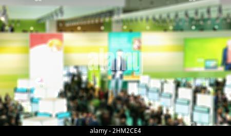 Trade show generic background with an intentional blur effect applied ...