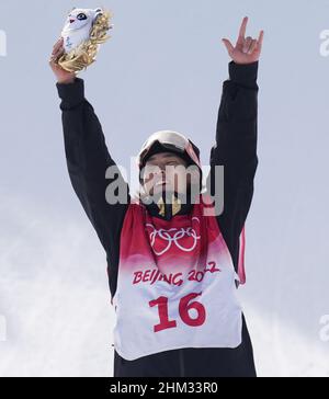 Su Yiming of China celebrates his gold medal in the men's snowboard big ...
