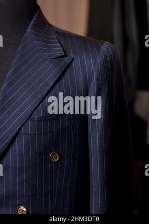 Luxury men's jacket on mannequin in studio. men's stylish checkered ...