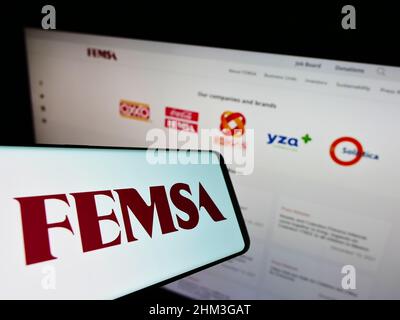 Femsa logo on smartphone Stock Photo - Alamy