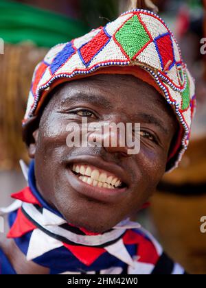 Street performer in traditional attire during carnival in the ...