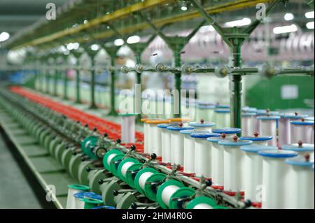 Silk reeling workshop processing Stock Photo - Alamy