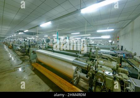 Silk reeling workshop processing Stock Photo - Alamy