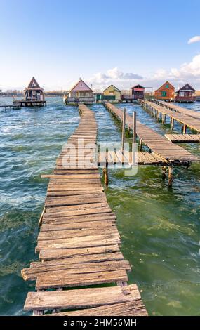 floating village bungalows in Bokod Hungary wit wooden pier Stock Photo ...