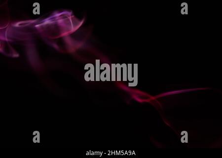Beautiful red and pink puffs of smoke Stock Photo - Alamy