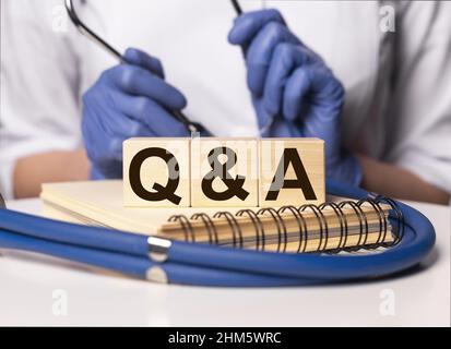 Healthcare and medical QA concept. QnA acronym. Questions and answers ...