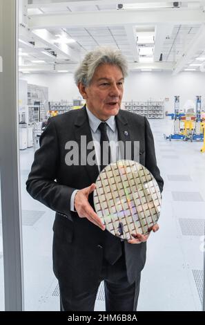 07 February 2022, Belgium, Löwen: An employee sits in a research center ...