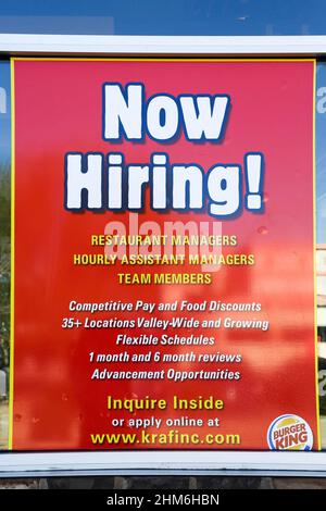 Hiring sign is displayed at a fast food restaurant in Northbrook, Ill ...
