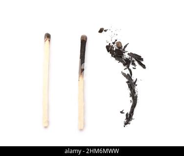 Different stages of burnt matches on light blue background, flat lay ...