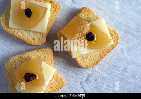 Delicious Mini Crackers with Apple, Cheese and Raisins Horizontal Stock ...