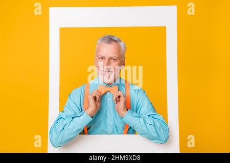 Photo of funny sweet guy dressed xmas green cardigan bowtie rising bank ...
