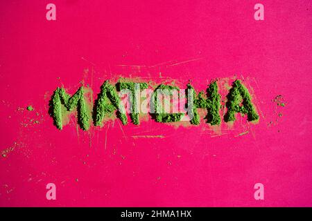 Tea word made of green tea leaves on wood background Stock Photo - Alamy