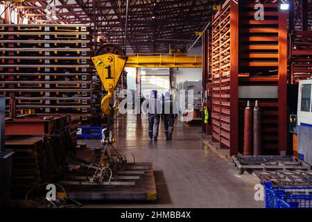 Industrial warehouse. Shelves with packs of goods Stock Photo - Alamy
