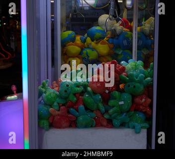 Game machine in arcade with Out of Order sign Stock Photo - Alamy