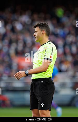 Referee Jesus Gil Manzano (Spain) shows Ilya Zabarnyi (PSG, obscured ...