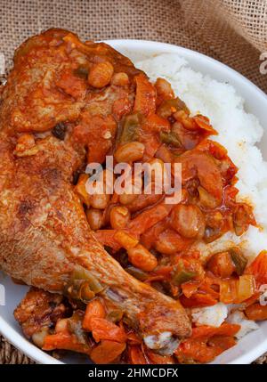 Traditional south African pap and roasted chicken, maize meal with ...