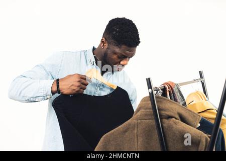 Handsome men changing clothes in locker room Stock Photo - Alamy