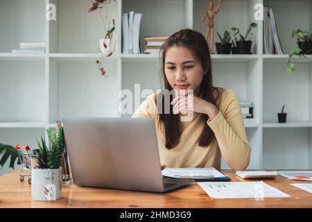 Happy young asian woman startup small business freelance with parcel ...